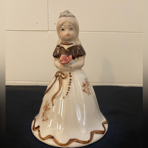 britt & co | Art | 96s Brown And White Girl With Flowers Vintage Bell ...